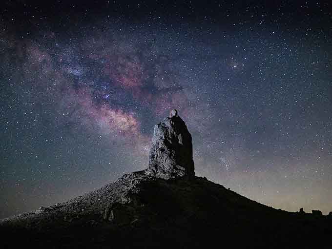 The Milky Way arching over a single spire is the kind of sight that makes you forget every worry you brought with you.