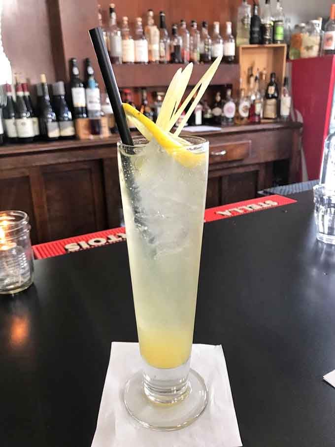 That tall refreshing Yuzu Ricky with its citrus garnish is basically summer in a glass, Minnesota winter be darned.