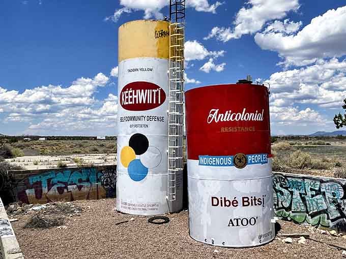 These painted tanks carry messages of resistance and remembrance on land with profound cultural significance.