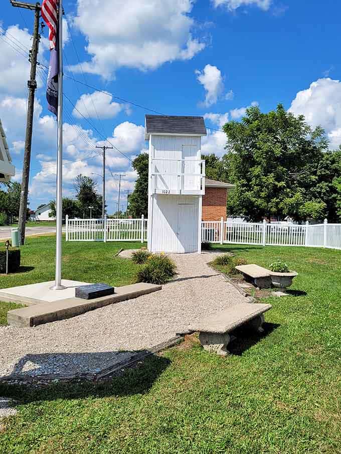 Seen from the side, the outhouse looks almost like a tiny lighthouse guiding travelers toward something unforgettable.