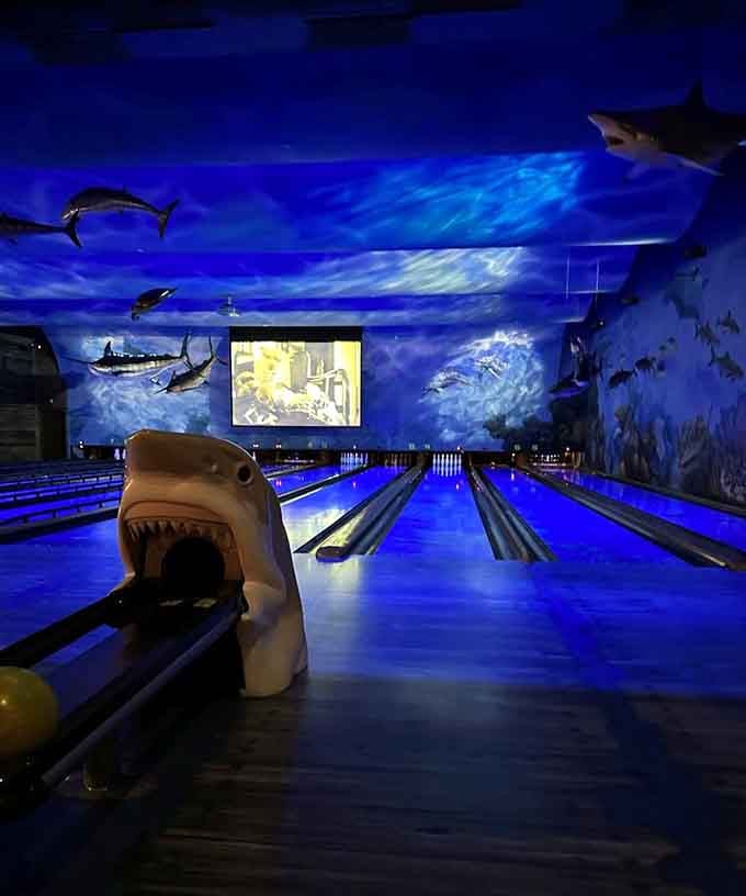 A shark ball return, glowing blue lanes, and painted marlins overhead, this bowling alley skipped ordinary and never looked back.