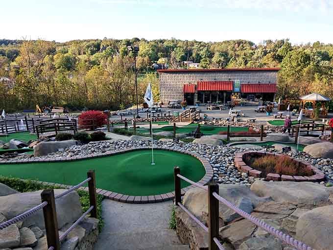 Miniature golf course sprawling across hillside terrain, where putting skills matter less than enjoying the gorgeous Pennsylvania scenery.