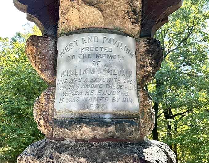 A stone marker reveals the pavilion's true name, the West End Pavilion, erected in memory of William McIlvain. History hiding in plain sight.