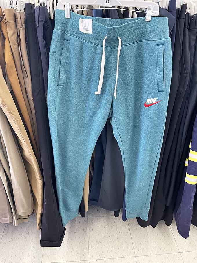 A Nike pair of joggers hanging right there on the rack, because name brands absolutely show up here regularly.