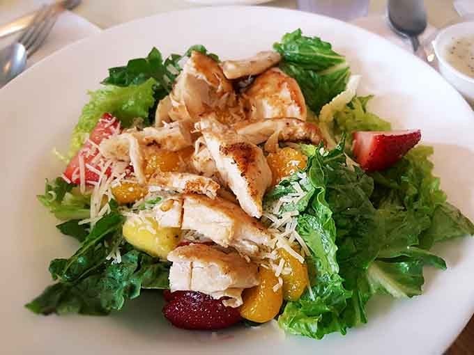 Grilled chicken, fresh greens, mandarin oranges, and strawberries. Proof that Walker's takes the whole menu seriously, not just the pie.
