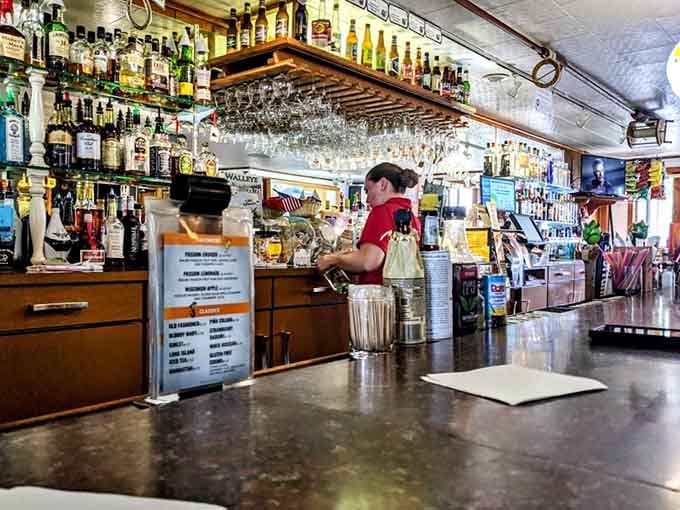 A fully stocked bar where the Old Fashioneds flow freely and nobody's in a hurry to leave.