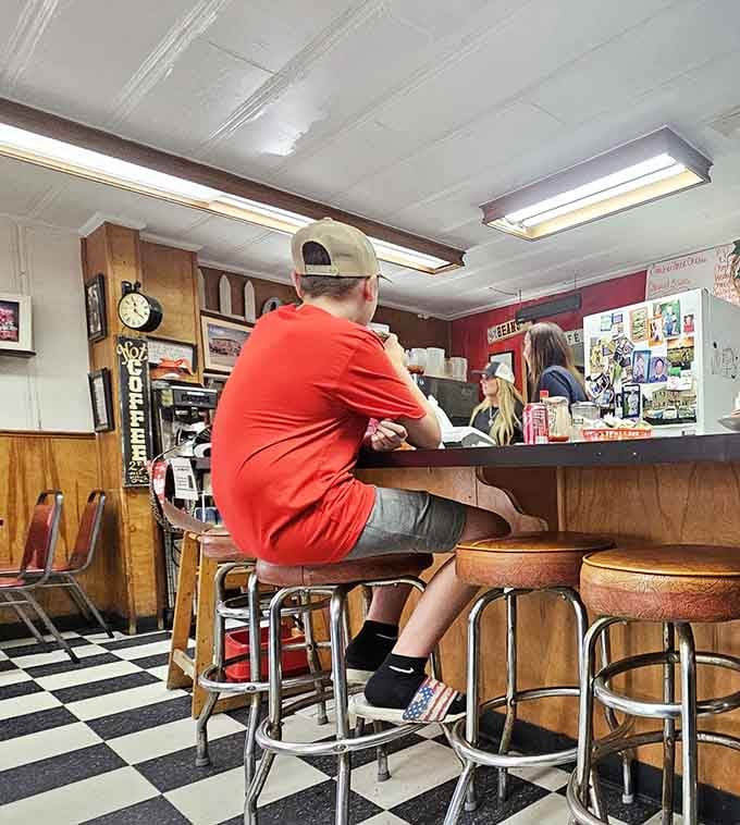 Counter seating where locals gather to solve the world's problems over coffee and whatever the daily special happens to be.