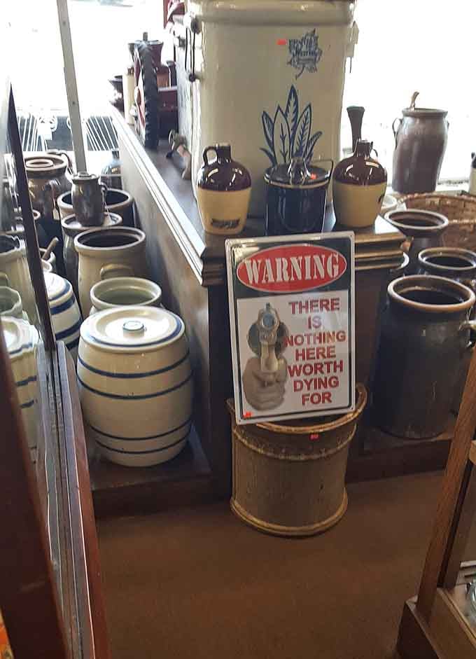 Stoneware jugs, crocks, and a "Warning" sign with a sense of humor, Southern charm at its most honest.