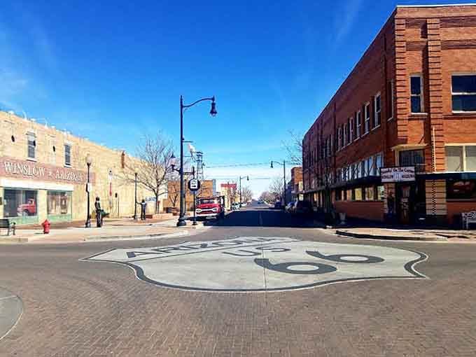 That Route 66 shield painted right into the pavement is Winslow's way of saying, "Yes, this is really happening."