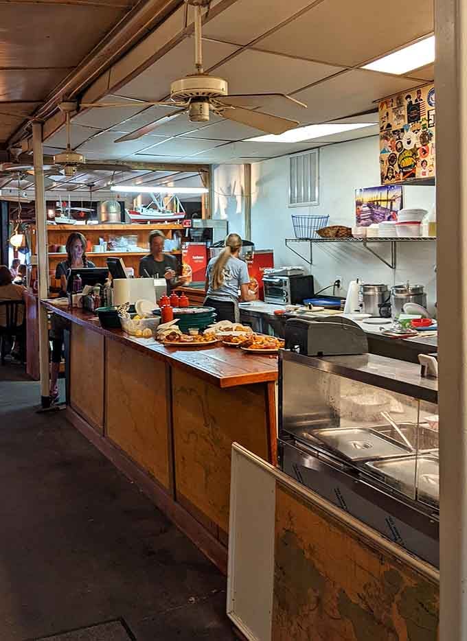 Behind that well-worn counter, plates of serious seafood are assembled with the quiet confidence of people who've done this forever.