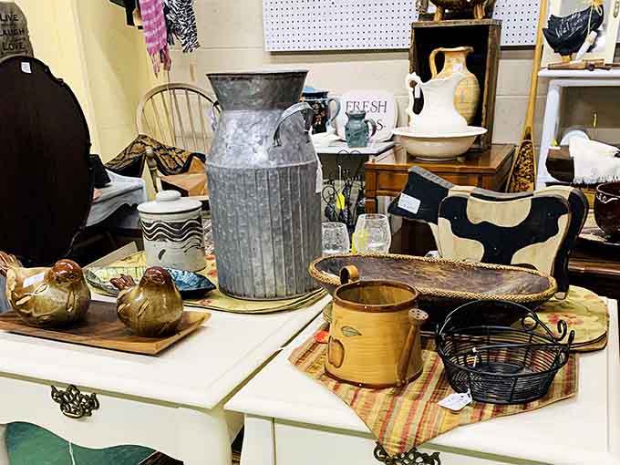 Galvanized pitchers, ceramic birds, and woven trays arranged so nicely you'd think a very talented grandmother styled the whole thing.
