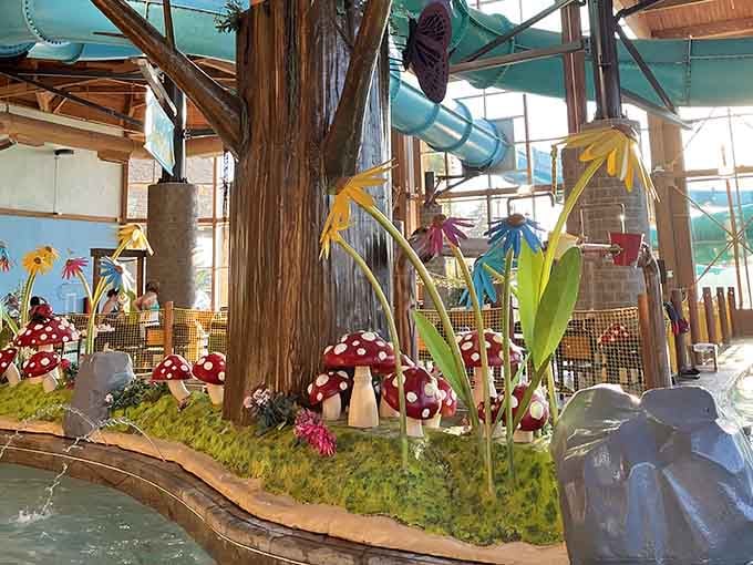 Giant mushrooms, oversized flowers, and a lazy river winding past it all, this corner of the park is pure storybook magic.