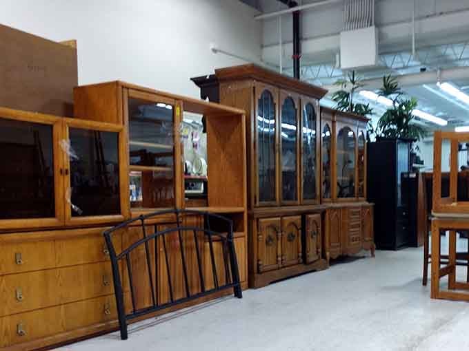 Wooden cabinets standing proud, waiting to store someone's dishes instead of gathering dust in a landfill somewhere.