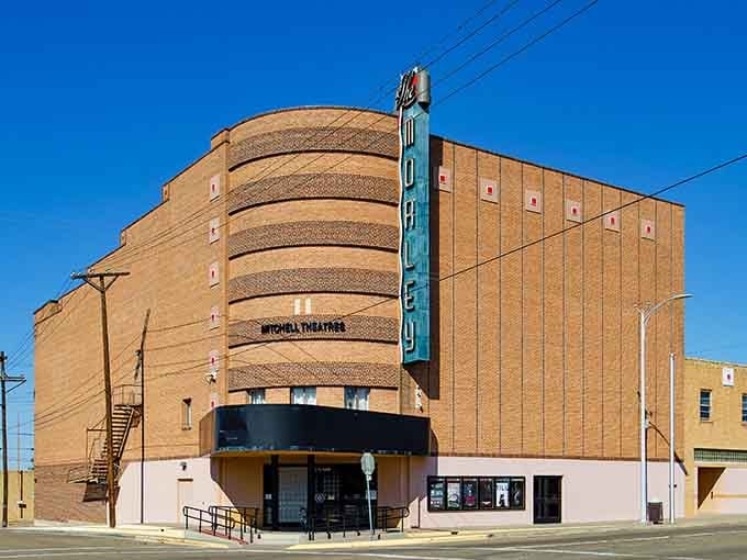 Morley Theatre curves into the corner with Art Deco confidence, its vintage sign still stealing the show.