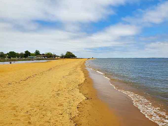 That long sweep of warm golden sand hugging the calm Chesapeake Bay waters is the kind of simple, honest beauty that never gets old.