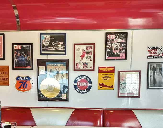 Life magazine covers, a Joey Dee record, and a Studebaker sign. Every wall tells a story worth reading slowly.