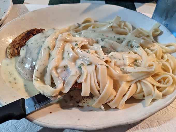 Chicken fettuccine alfredo so creamy and generous it practically dares you to finish the whole plate. Challenge accepted.