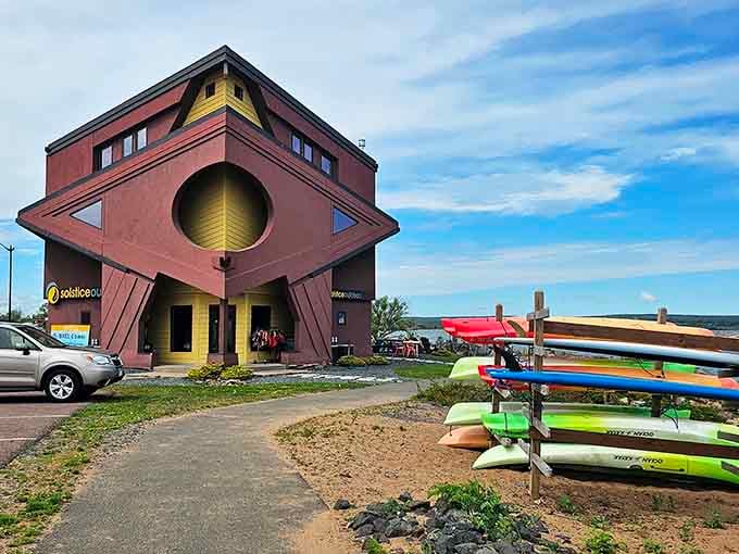 Blue Wave Inn's unique architecture catches your eye immediately, standing out like a geometric puzzle on the shoreline.