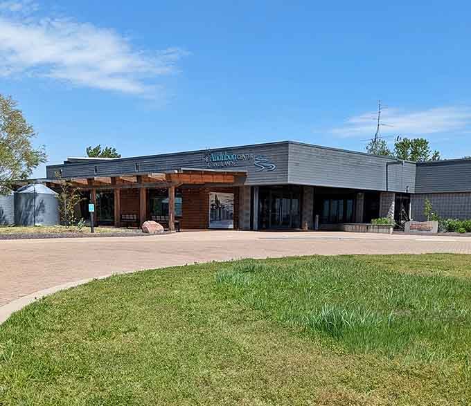 The visitor center stands ready to transform casual observers into passionate birders, one species identification at a time.