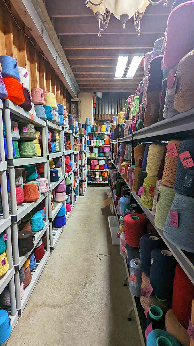Spools of colorful yarn fill an entire room, a crafter's dream tucked inside a Connecticut warehouse.