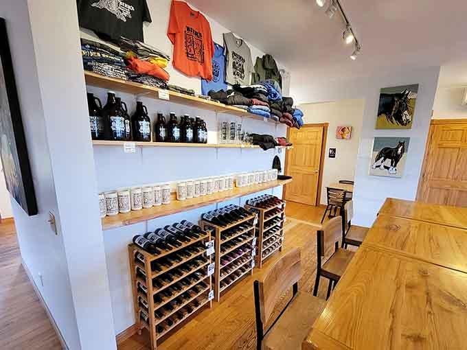 T-shirts, hoodies, growlers, and wine bottles lined up like a greatest hits collection. Take a little piece of Inwood home with you.