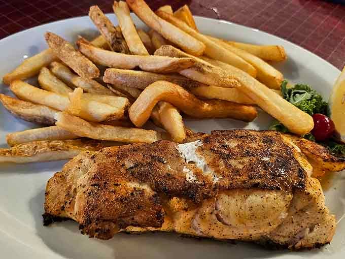Grilled fish with fries proves that sometimes simple preparations let quality ingredients shine brightest on your plate.