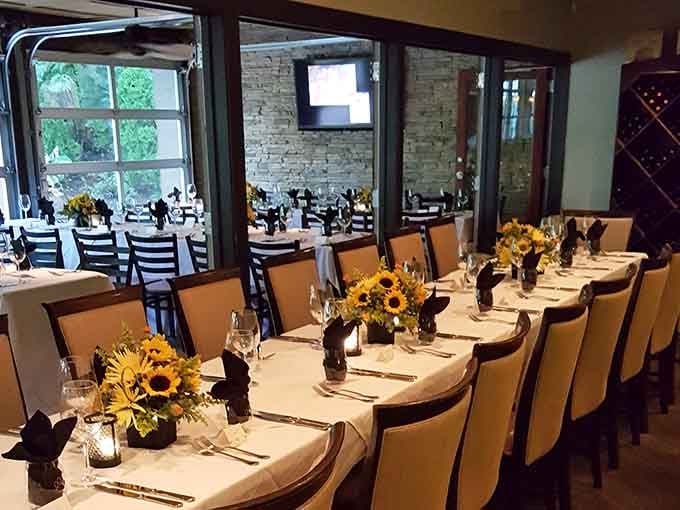 Sunflowers on white linen, candlelight, and wine glasses ready to go. This private dining setup is genuinely stunning.