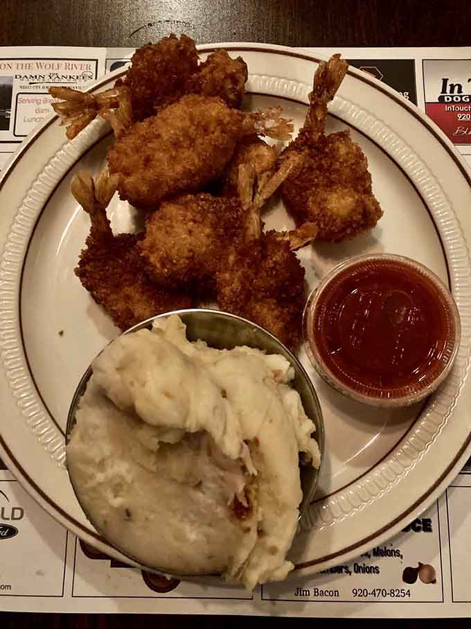 Hand-breaded fantail shrimp with cheesy bacon mashed potatoes, comfort food that makes you wonder why you ever ate anywhere else.