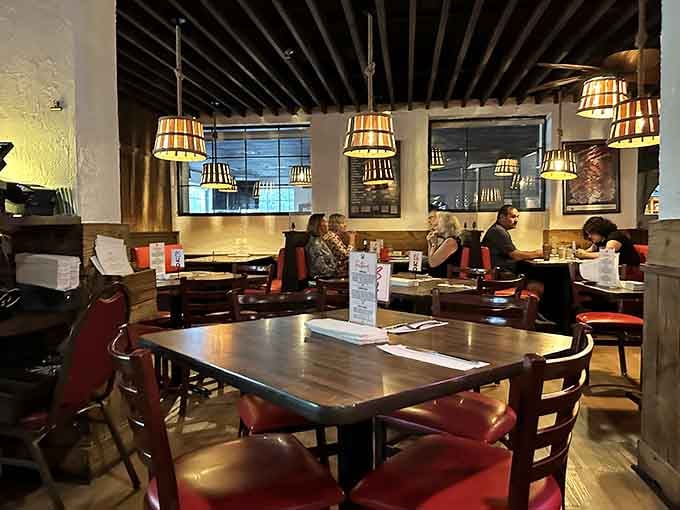 Groups of diners leaning in, laughing, and sharing plates. Bob Chinn's has a way of turning strangers into regulars.