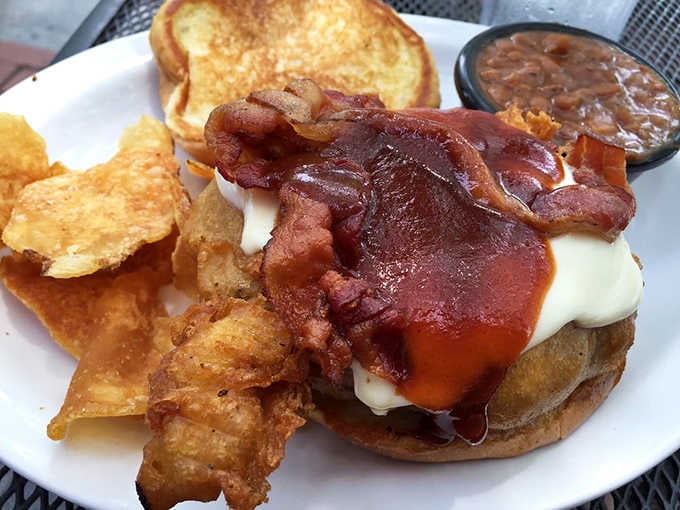 Bacon, BBQ sauce, and melted cheese piled high enough to make a cardiologist nervously clear their throat.