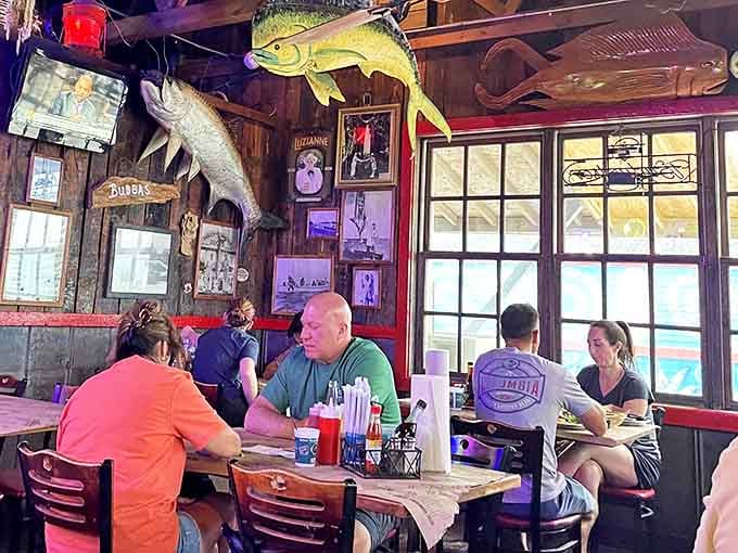Happy people, good food, and a mahi mahi mount overhead watching it all go down. Perfection.
