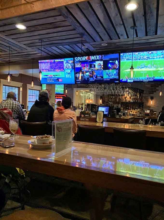 Multiple screens, cold beer on tap, and a full bar — game day just found its new permanent address.