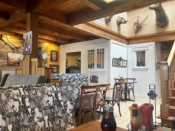 Mounted antlers, cowhide upholstery, and warm wooden beams. This dining room has more character than most people do.