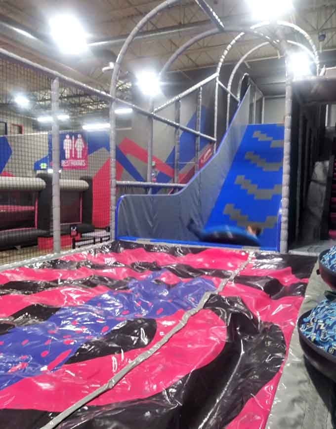 Up, over, and straight into the foam. The Mega Chute slide delivers a landing you won't forget quickly.