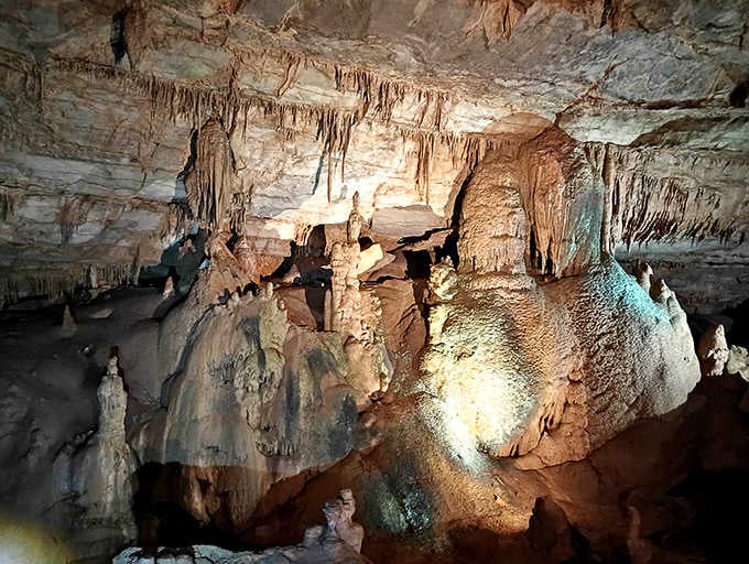 Stalactites and stalagmites create a forest of stone that took millennia to grow this magnificently.