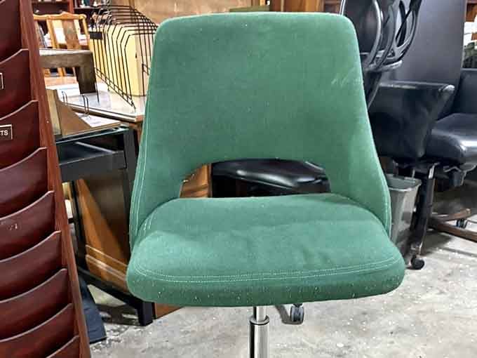 That retro green office chair is cooler than anything you'd find in a modern furniture catalog.