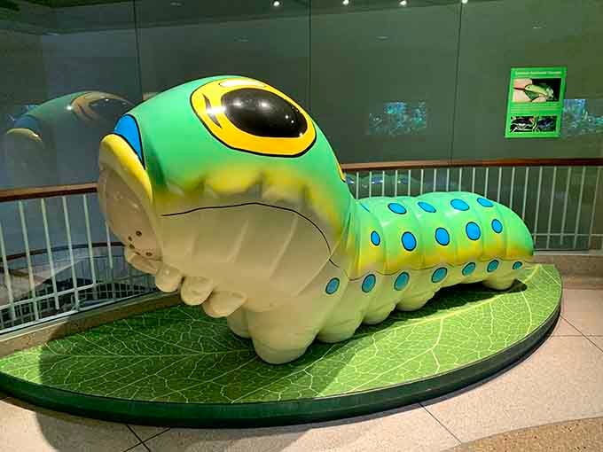 This cheerful caterpillar sculpture is Instagram gold, proving that even the awkward teenage phase of butterflies deserves some love too.