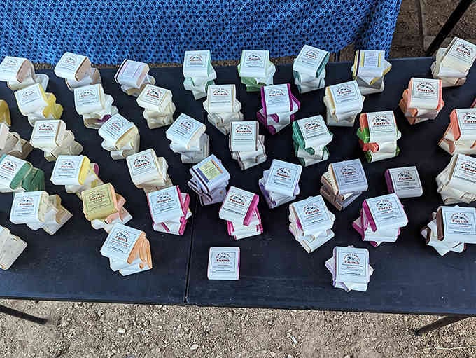 Handmade soaps lined up like colorful soldiers, ready to make your bathroom smell infinitely better than it currently does.
