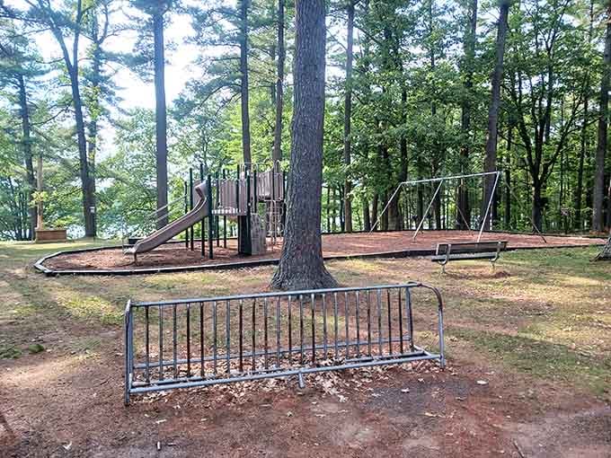 The playground where kids burn off energy while parents finally remember what relaxation feels like again.