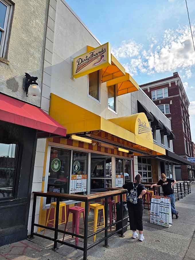 Yellow stools, outdoor seating, and a Palace worth crossing town for on any given afternoon.