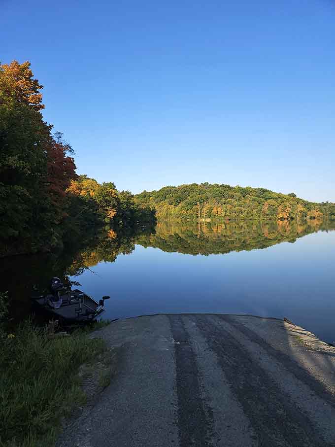 Early morning light, a boat ramp, and a glassy lake wrapped in fall color. Kentucky, you really outdid yourself here.
