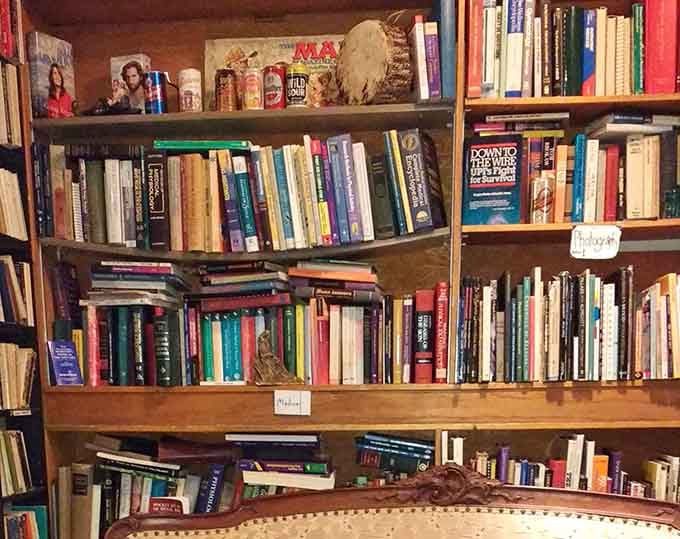 Medical books, photography titles, and a few mystery cans on the top shelf, this corner rewards the curious browser.