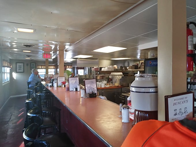 Counter seating where locals gather to solve the world's problems, one breakfast sandwich at a time.