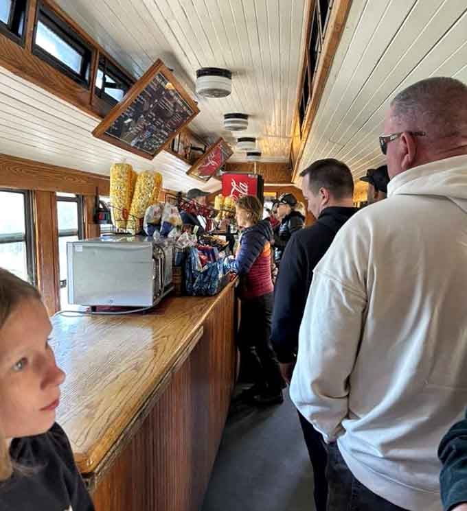 Popcorn, snacks, and good company in the onboard snack bar, mountain travel has never been this civilized.