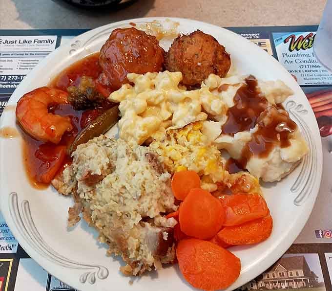 Meatballs, shrimp, mac and cheese, stuffing, carrots, and mashed potatoes all on one plate. The buffet here plays no games whatsoever.