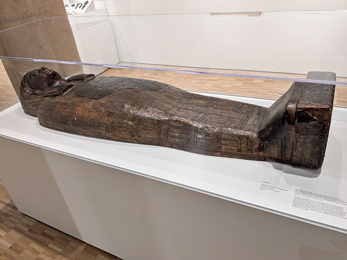 An Egyptian coffin, thousands of years old, quietly reminding you that some things are genuinely bigger than your Tuesday afternoon.