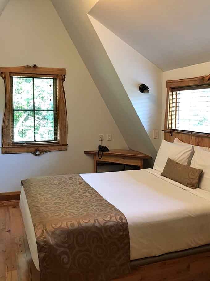 Rustic wood frames, slanted ceilings, and treetop views. This room has the quiet confidence of someone who knows they're great.