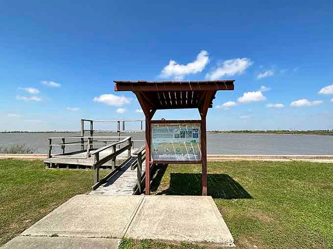 A wooden dock, open water, and a map that reminds you exactly where you are in history.