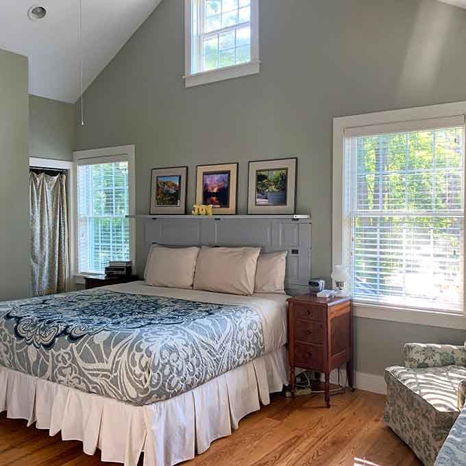 Vaulted ceilings, framed artwork, and light pouring in from every angle. Rest looks good here.