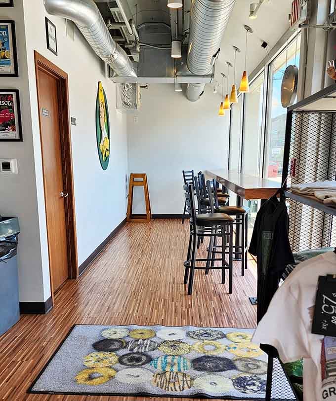 A cozy counter seating area with warm pendant lights, perfect for sitting down and savoring every last bite.